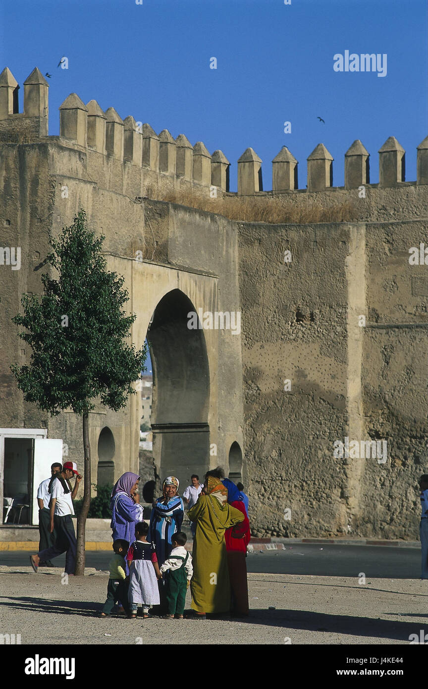 Morocco, fez, defensive wall, archway, passer-by no model release ...