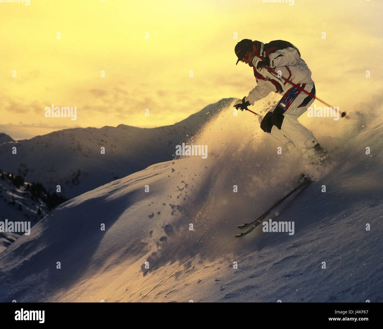 Skier, deep snow, morning light [M] Austria, Tyrol, mountains, alps ...
