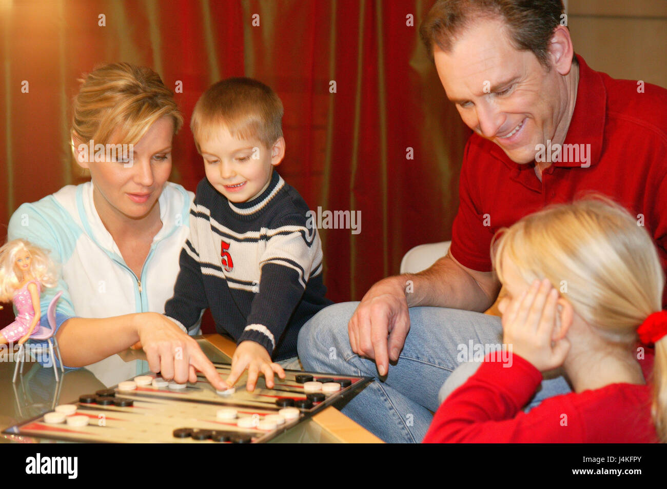 Sitting rooms, parents, children, board game, backgammon family, at ...