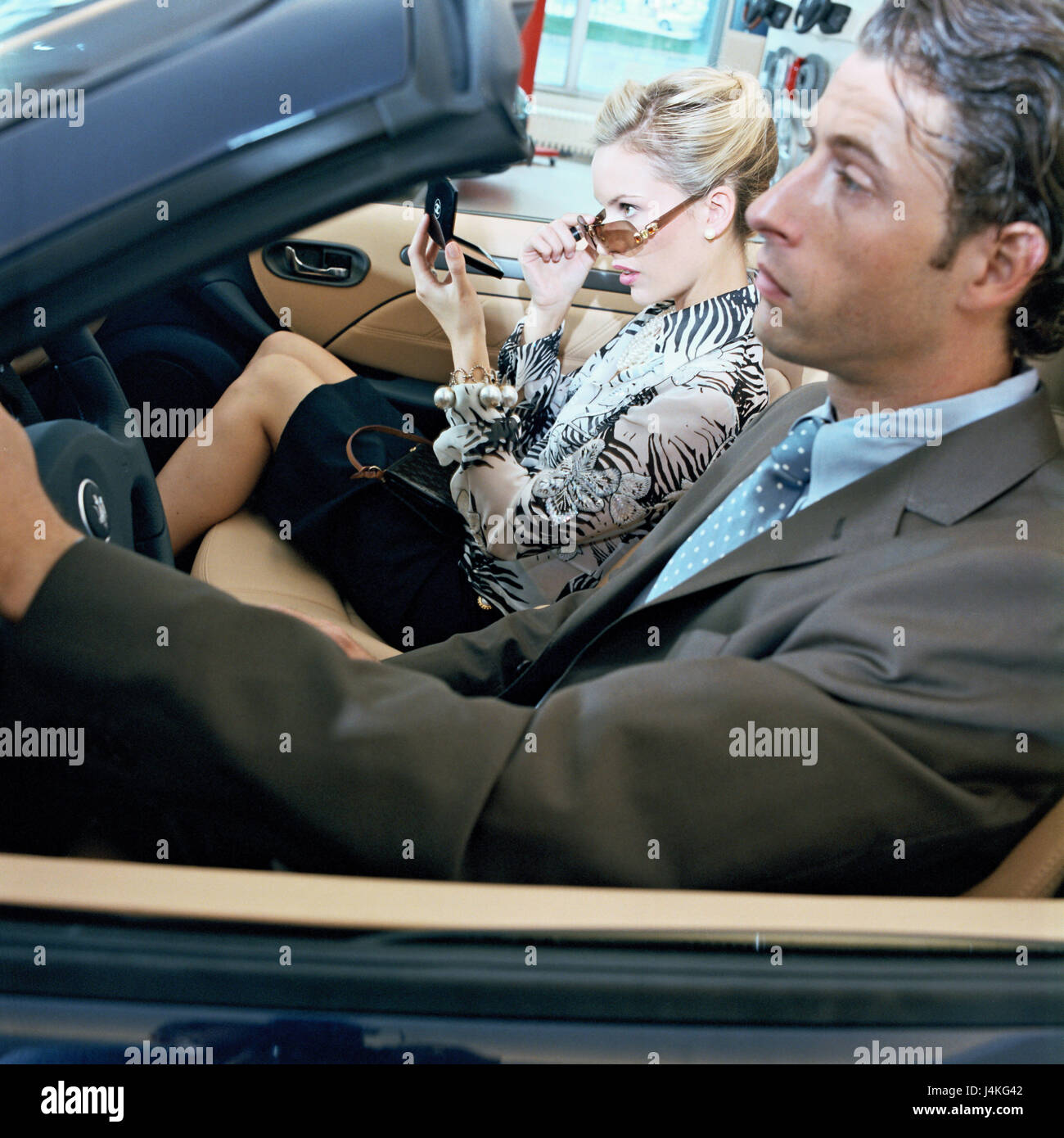 Convertible, couple, elegantly, woman, hand reflector, make up vehicle ...