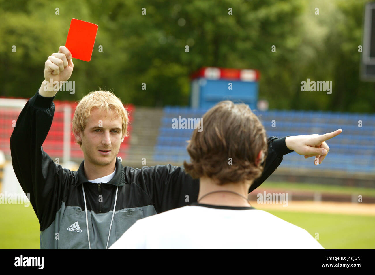 Football field, player, referee, card, red, show, eye contact, back ...