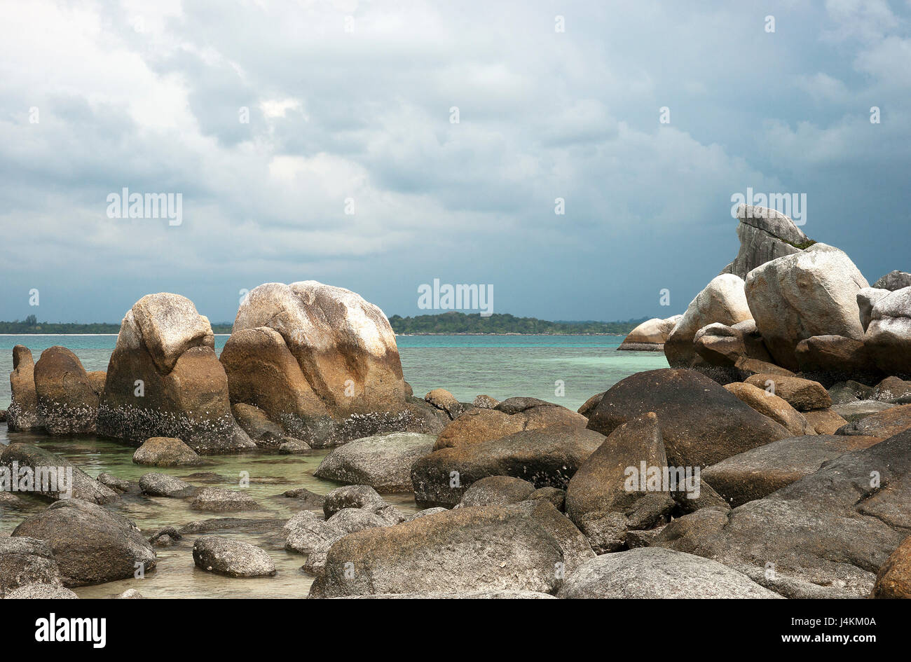 Natural rock formation on coast in Belitung Island in the afternoon ...