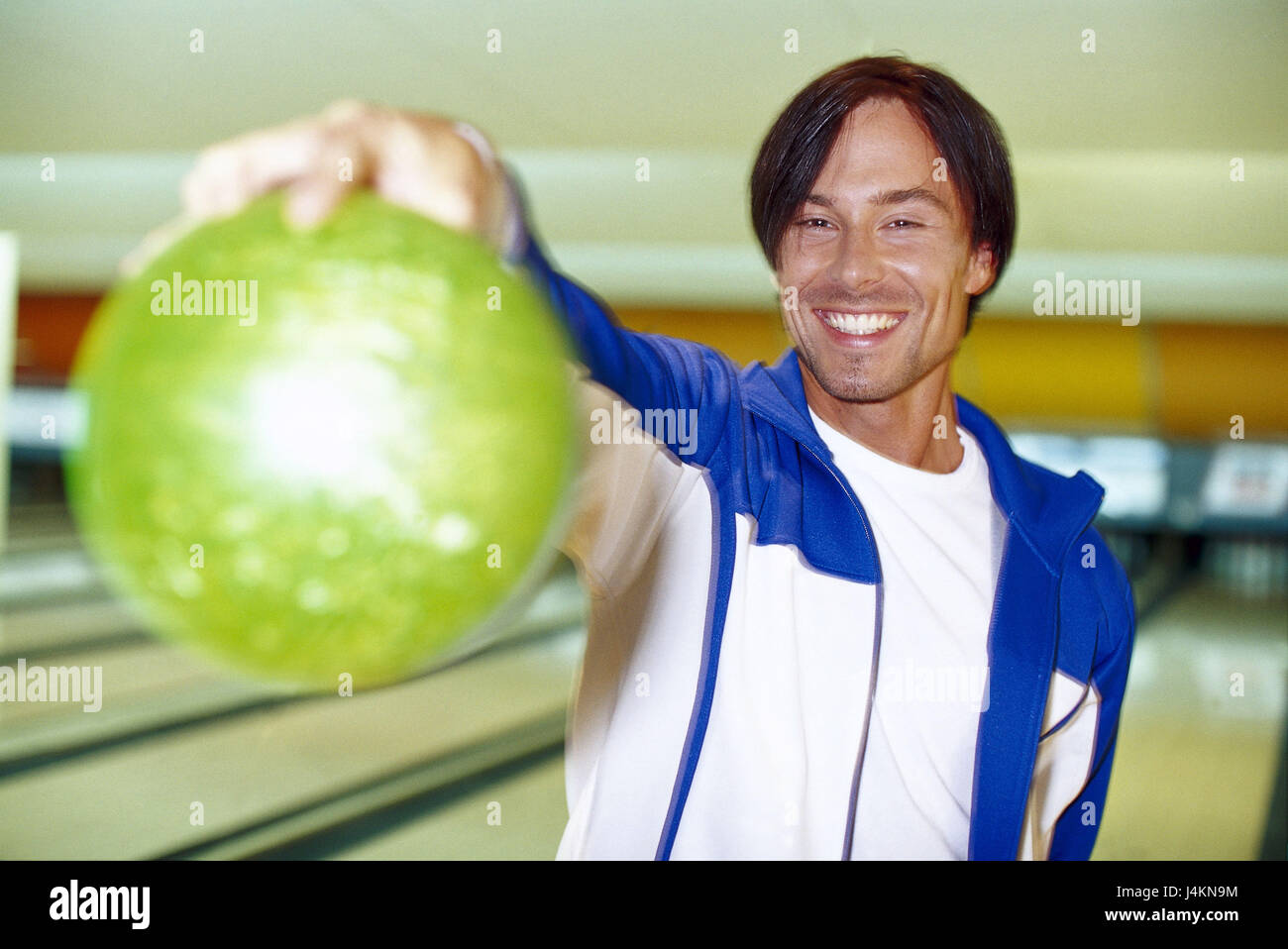 Skittle-alley, man, young, happily sphere, hold, portrait, blur man's ...