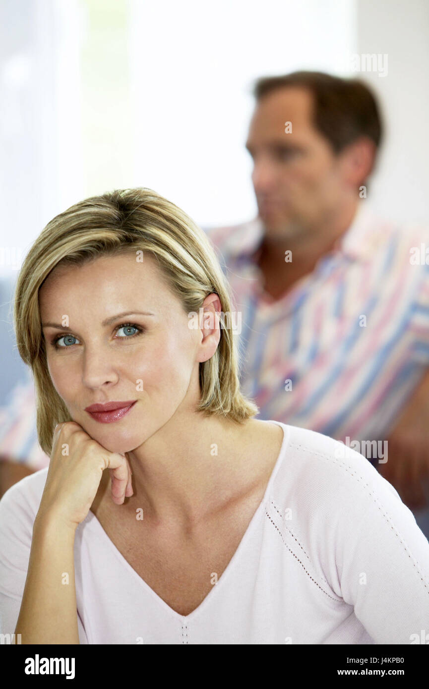 Woman, smile, confidently, background, man, sulk, turn away blur ...