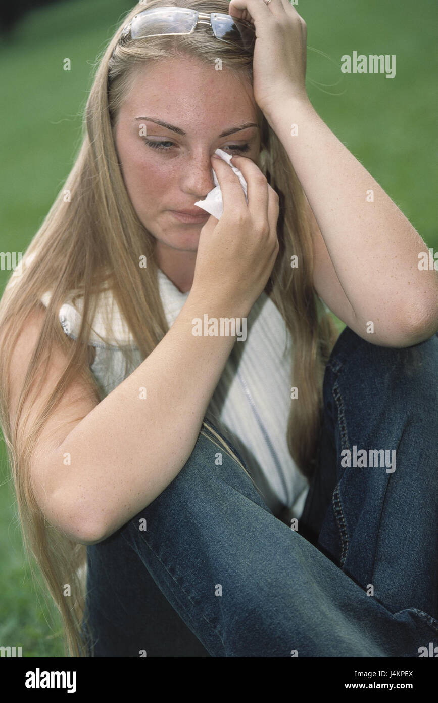 Meadow, girl, cry, handkerchief, sit, portrait outside, teenager, young ...