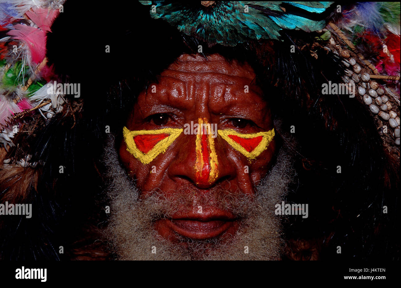 Papua New Guinea, man, Huli strain, feather jewellery, facial painting ...
