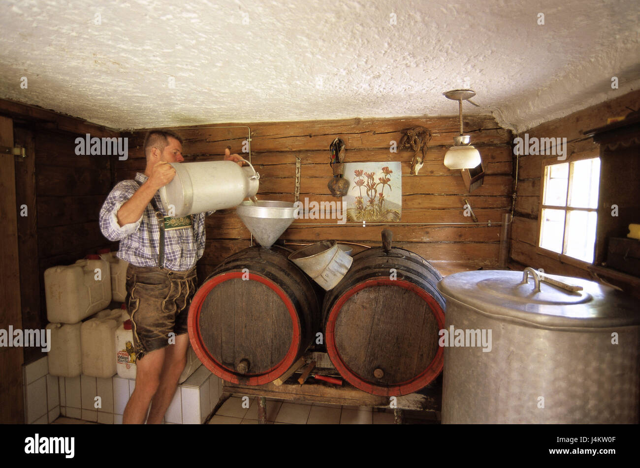 Germany, Berchtesgadener alps, schnapps distillery, man, leather ball ...