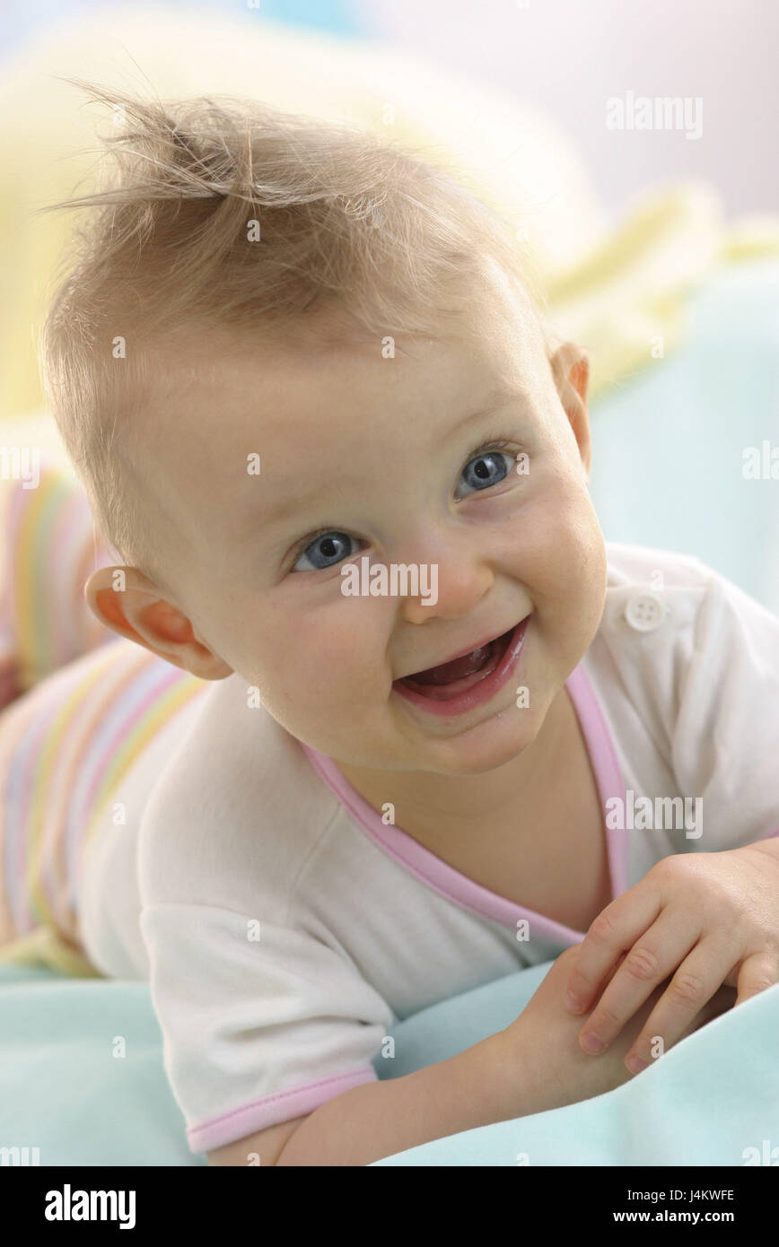 Baby, lie, caps, laugh, lift portrait child, small, 10 months, infant ...