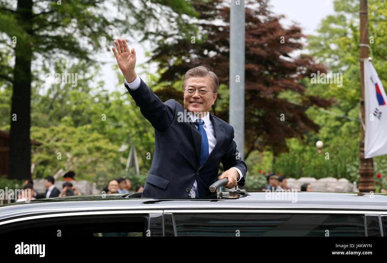 Newly elected South Korean President Moon Jae-In waves during the ...