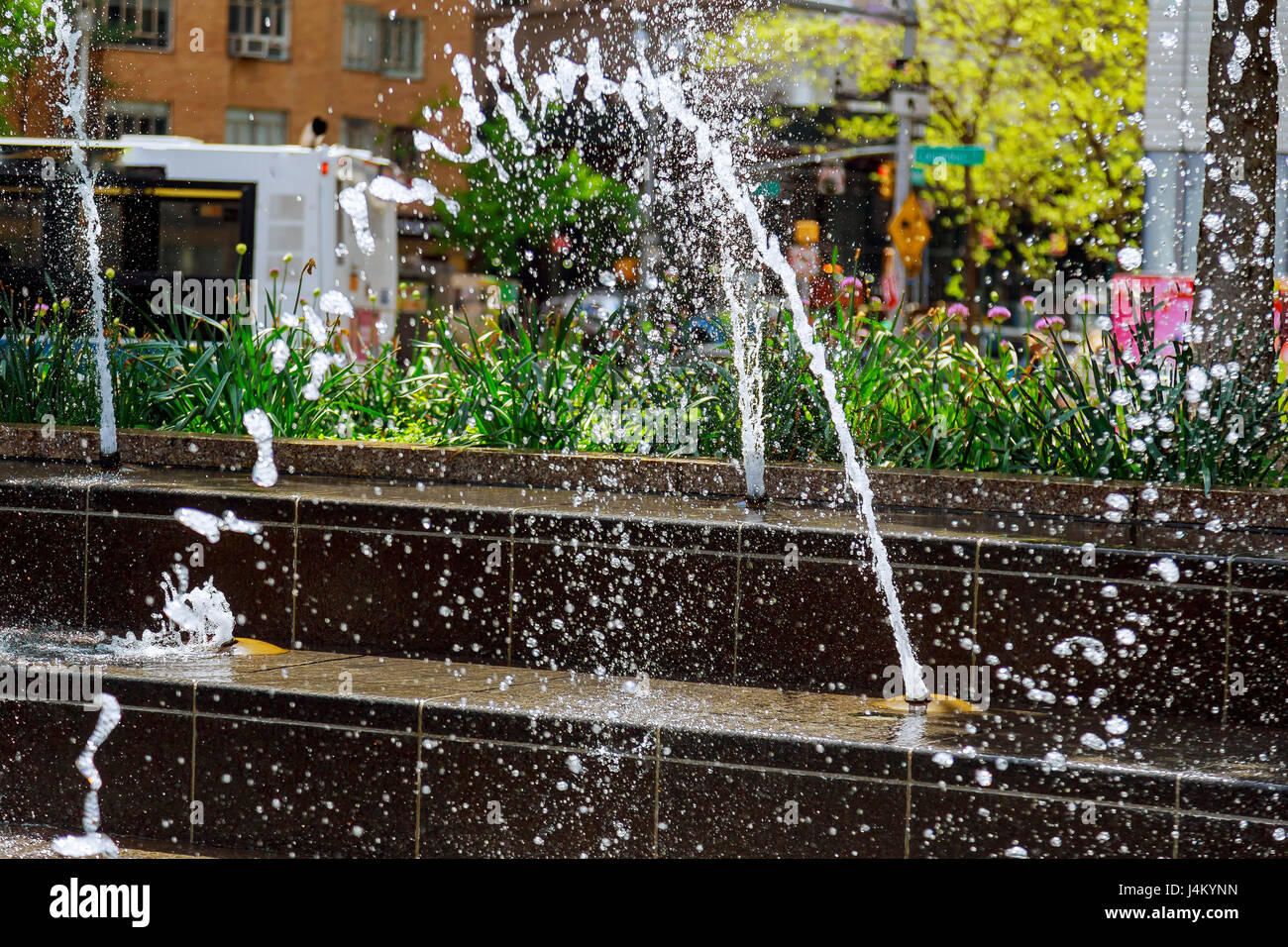 Water arches against the sky in a fountain in Splash of water fountain ...