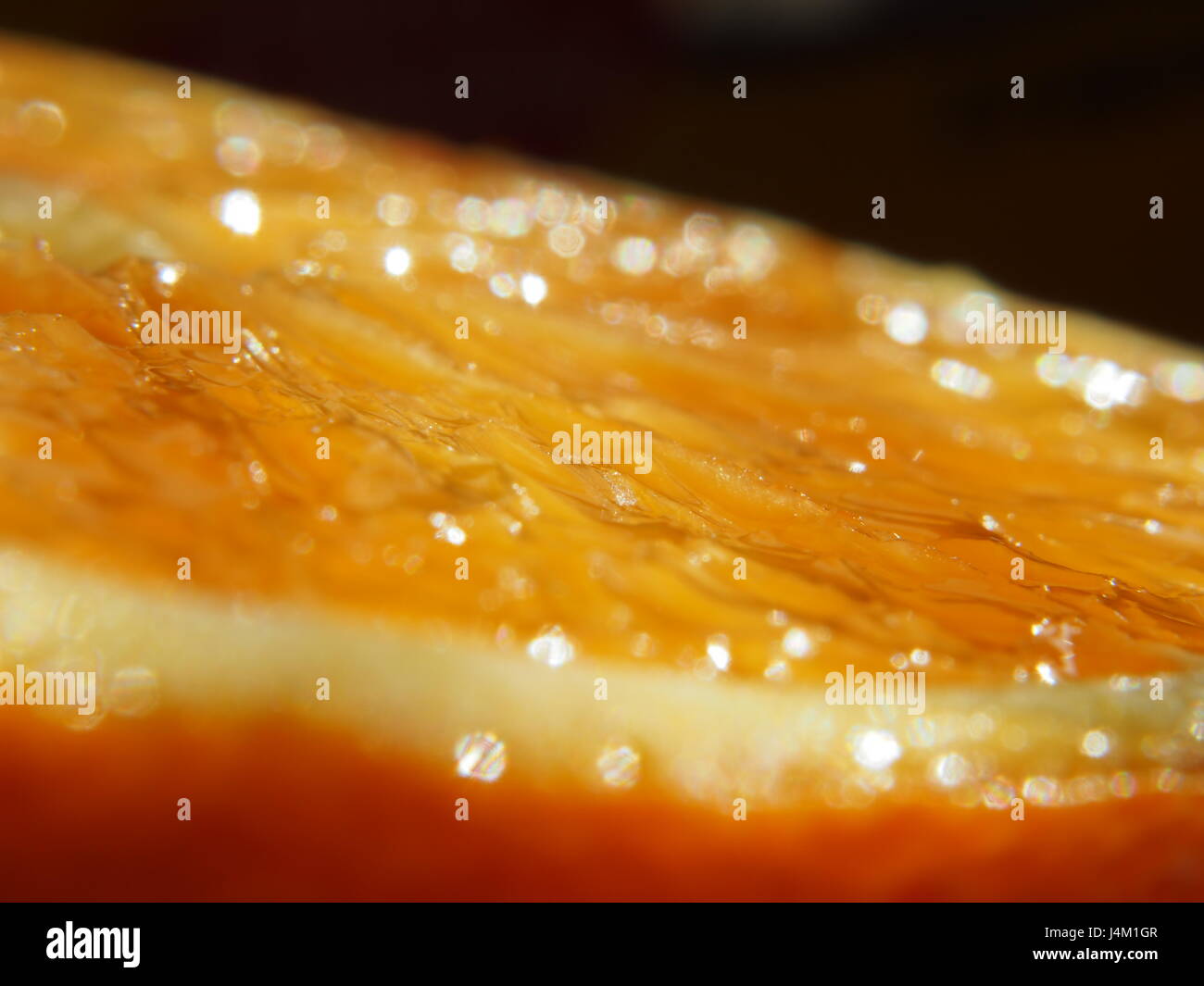 Extreme close up view of orange fruit Stock Photo - Alamy