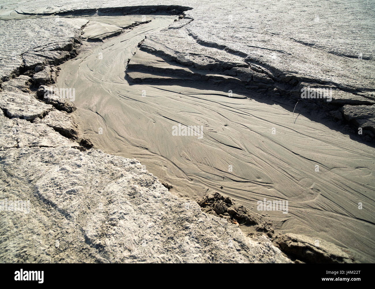 Dried creek with a pattern on the sand. Siberia, spring, the Ob Sea ...