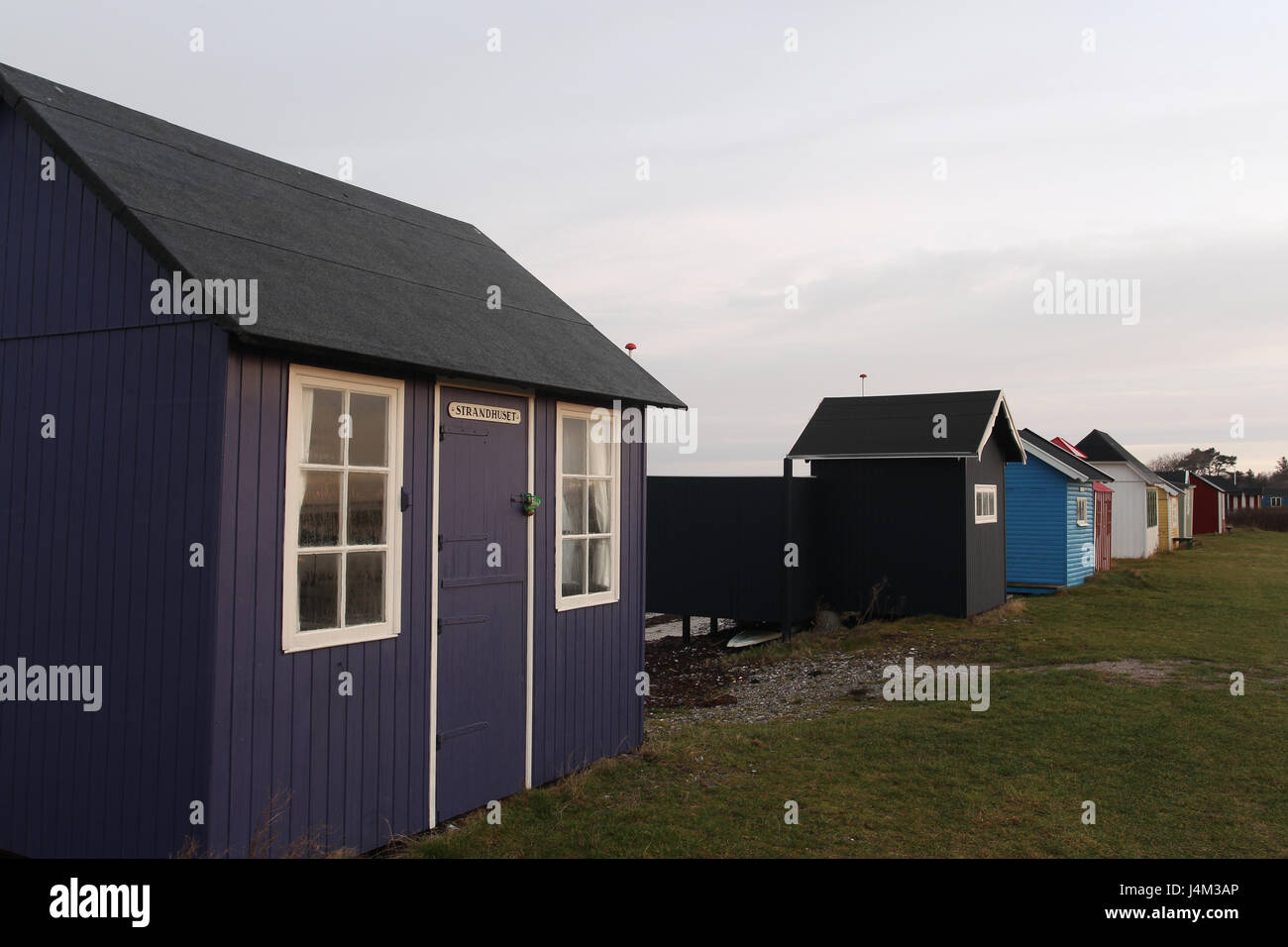 Small colorful beach houses on Aero Island, Denmark Stock Photo - Alamy