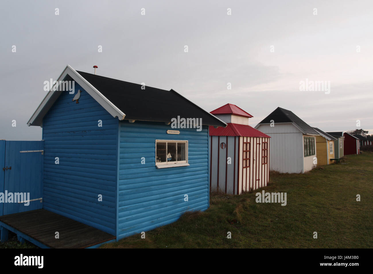 Small colorful beach houses on Aero Island, Denmark Stock Photo - Alamy