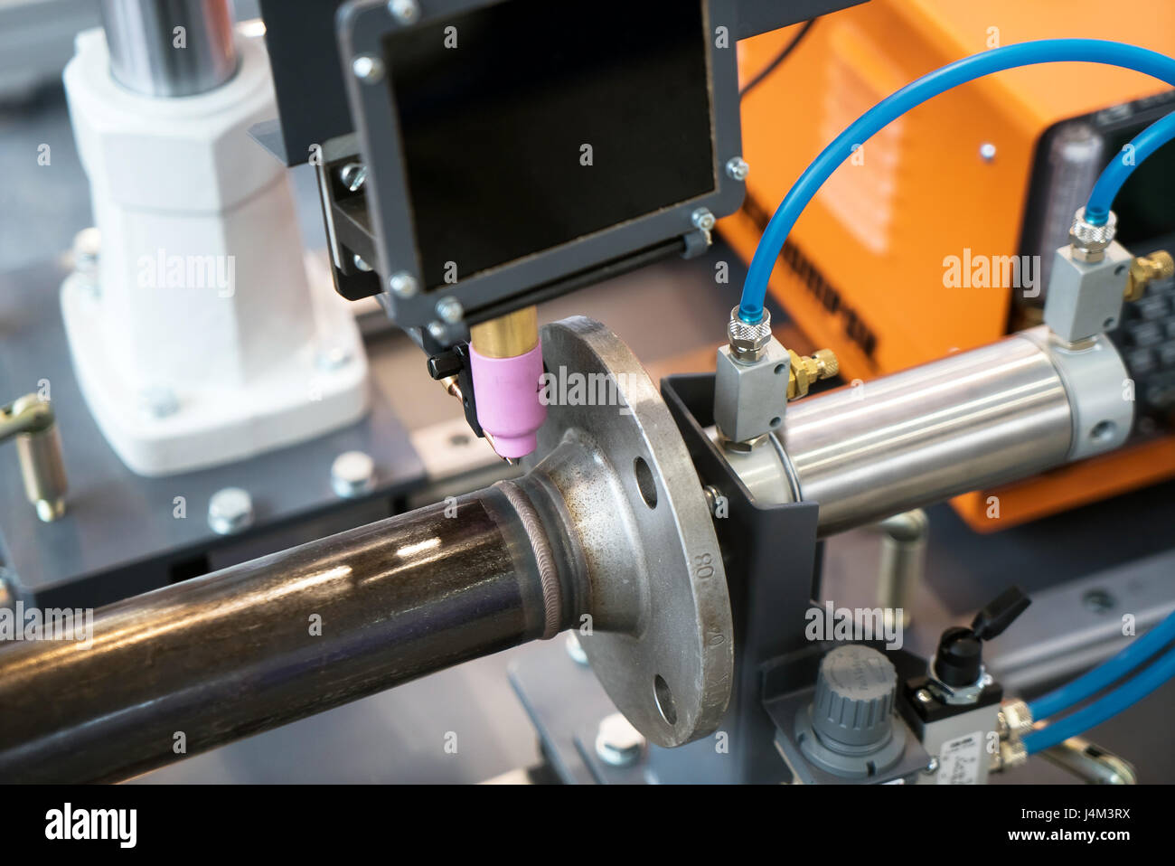 Compact welding head, Fully automatic welding process Stock Photo - Alamy