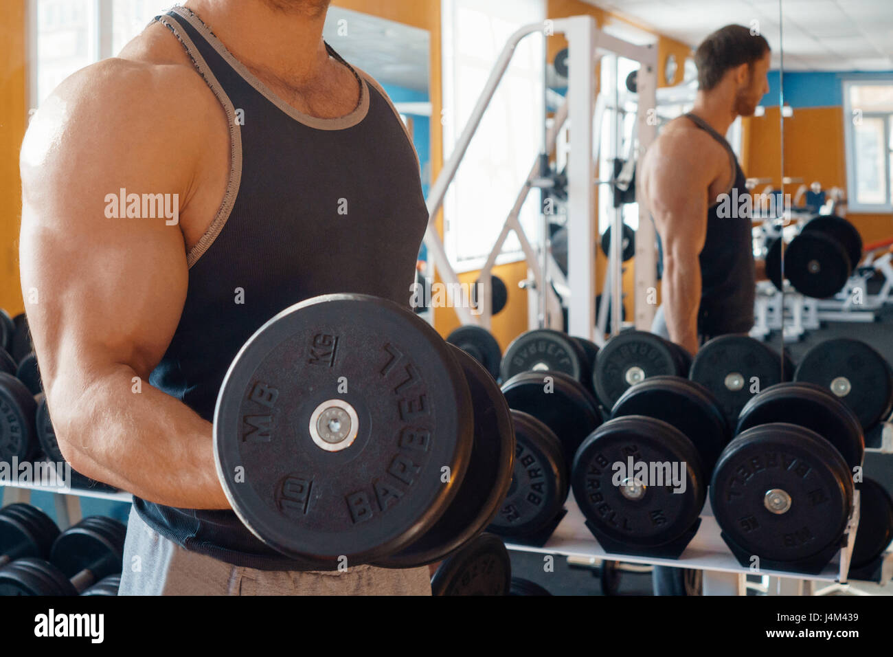 Male powerful biceps close-up. gym. Bodybuilder. A beautiful, inflated ...