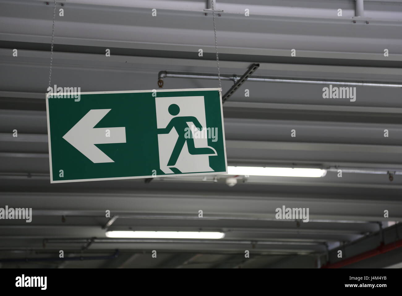 emergency exit sign Stock Photo - Alamy