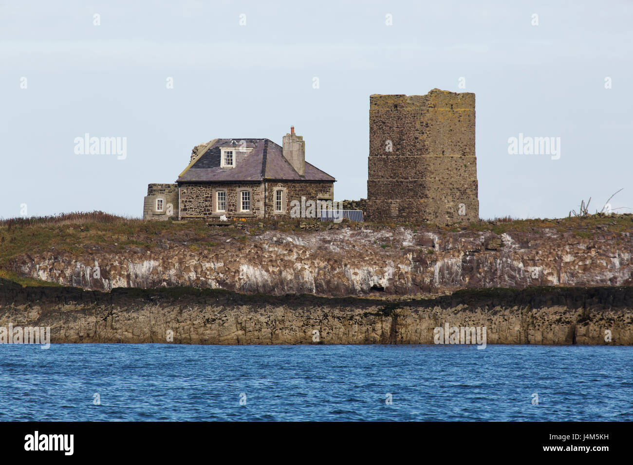 Cottage and Castell's Tower on Inner Farne Island, off the coast of ...