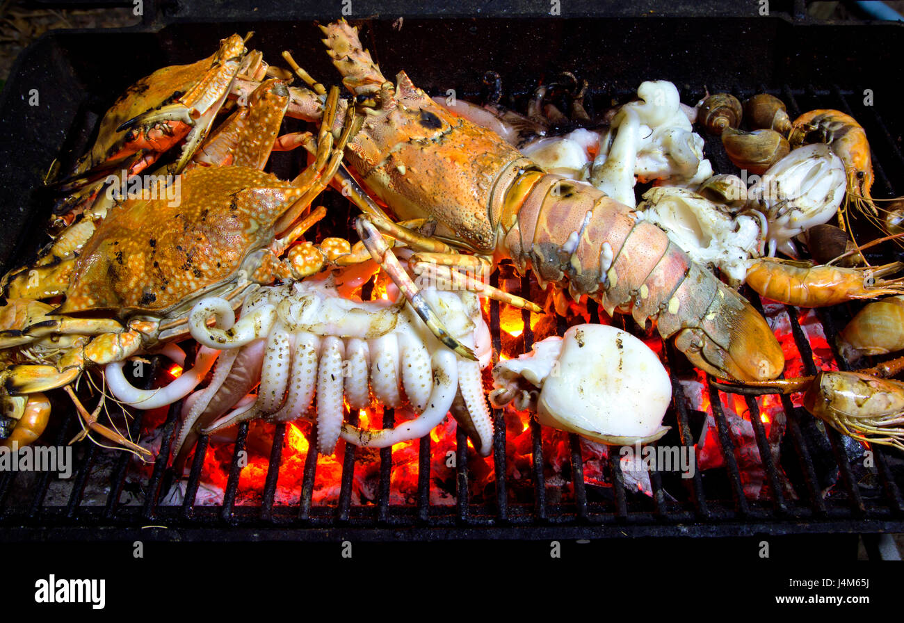 Grill mollusk lobster, crab, squid, mussel cooking seafood street food ...