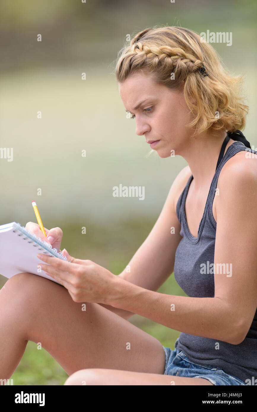 women write note at outdoor in the garden Stock Photo - Alamy