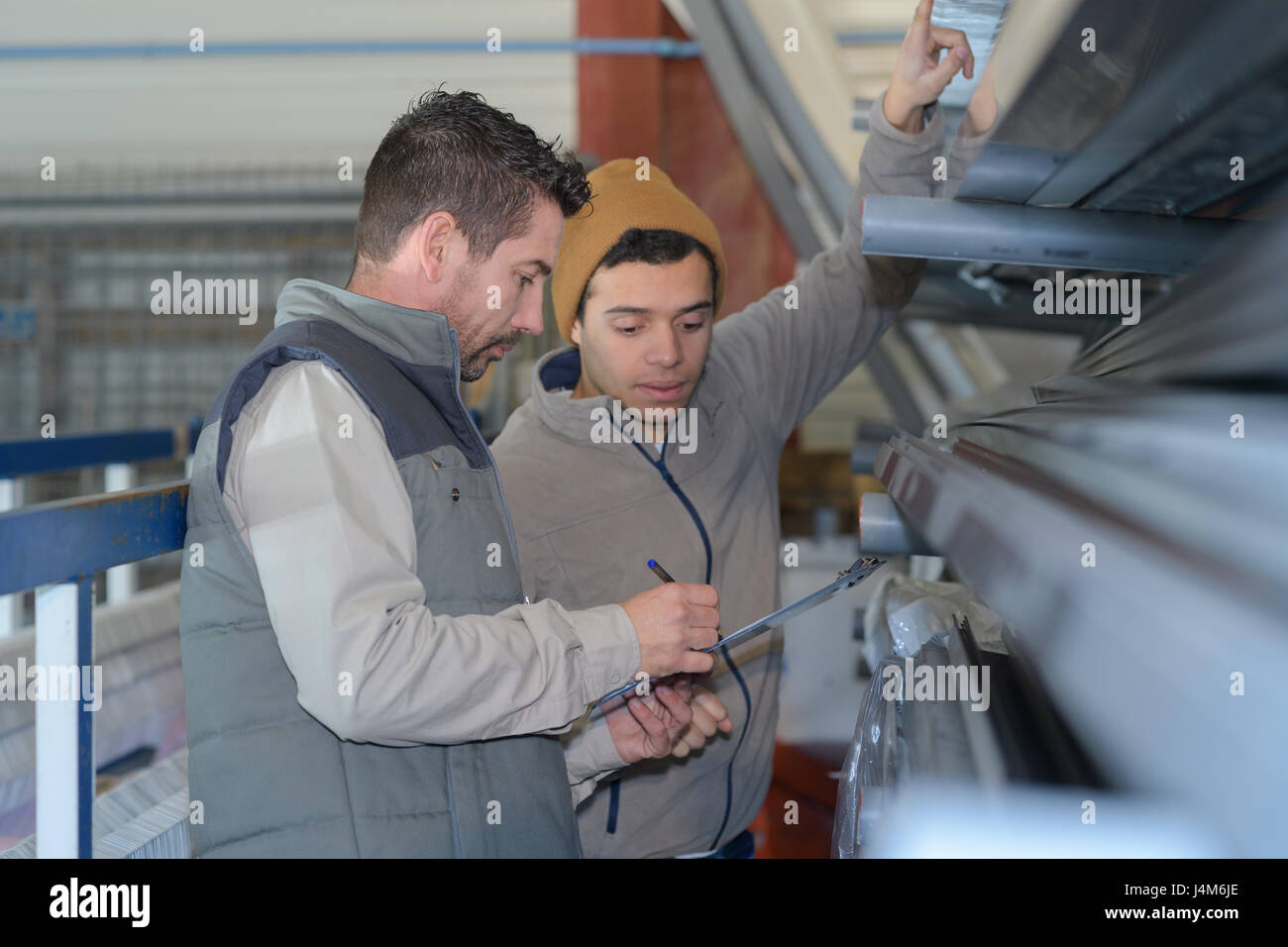 men working in newspaper factory Stock Photo - Alamy