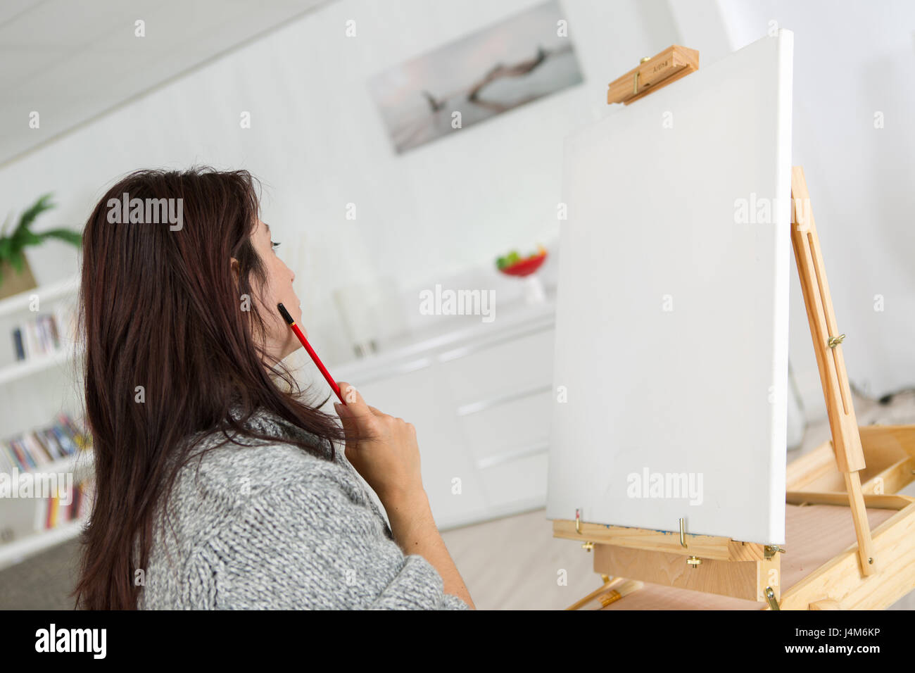 Artist looking at blank canvas hi-res stock photography and images - Alamy