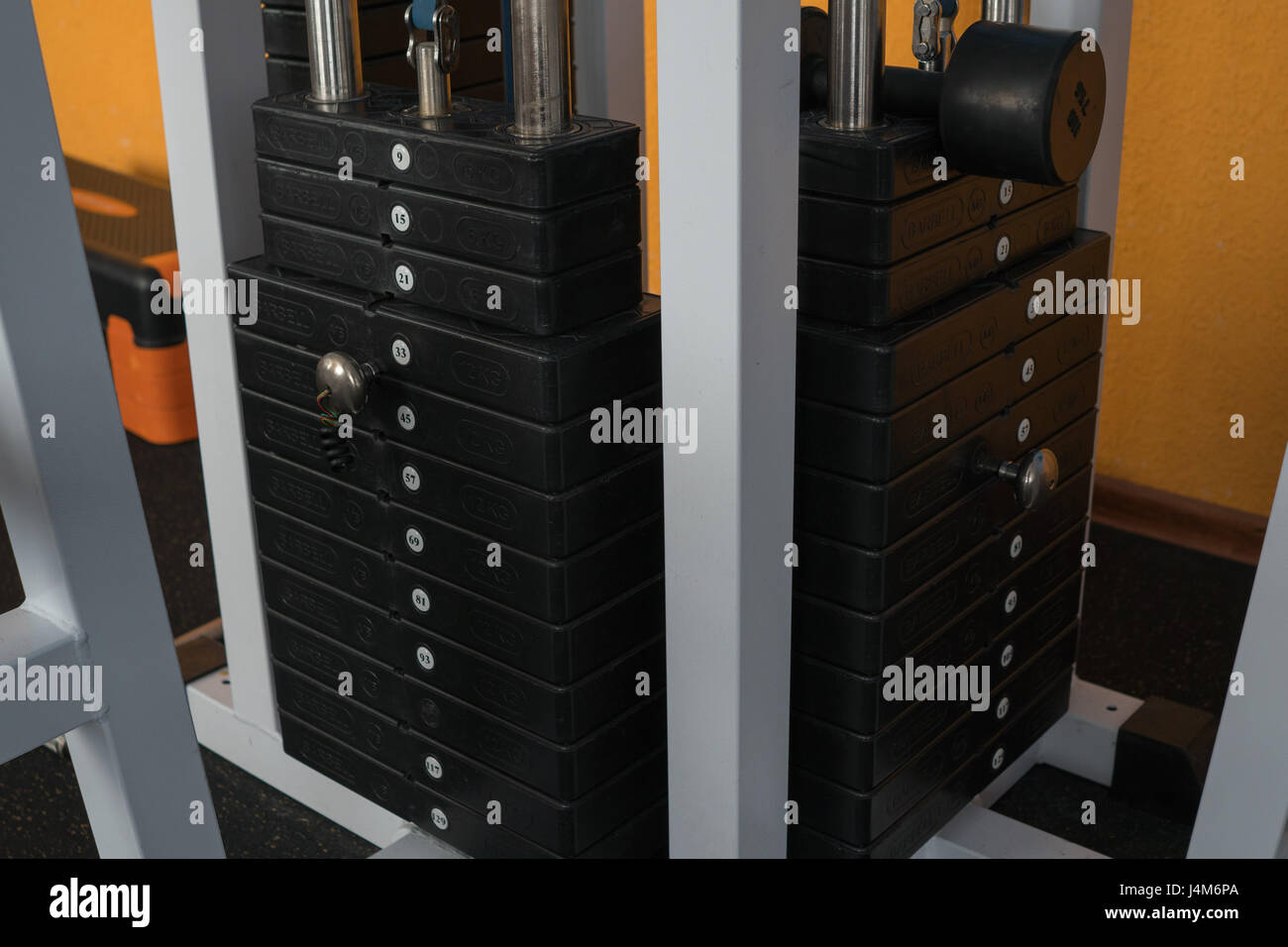 Weight machine at the gym Stock Photo - Alamy
