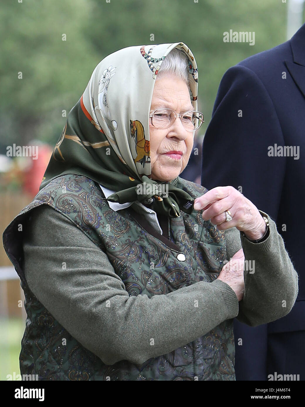 Queen Elizabeth II watches the Land Rover Driving Grand Prix at the ...