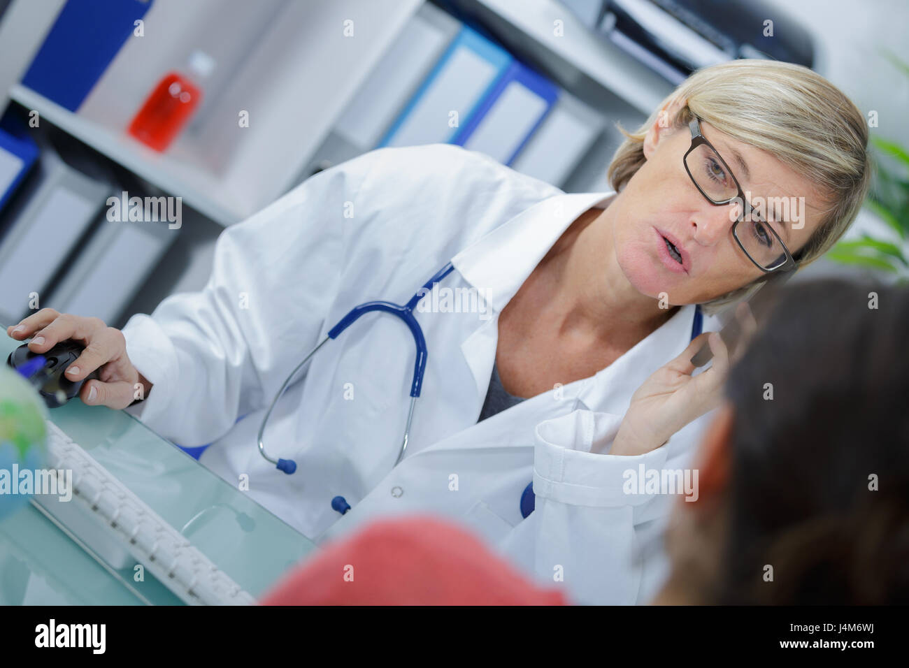 Beautiful female patient speaking hi-res stock photography and images ...