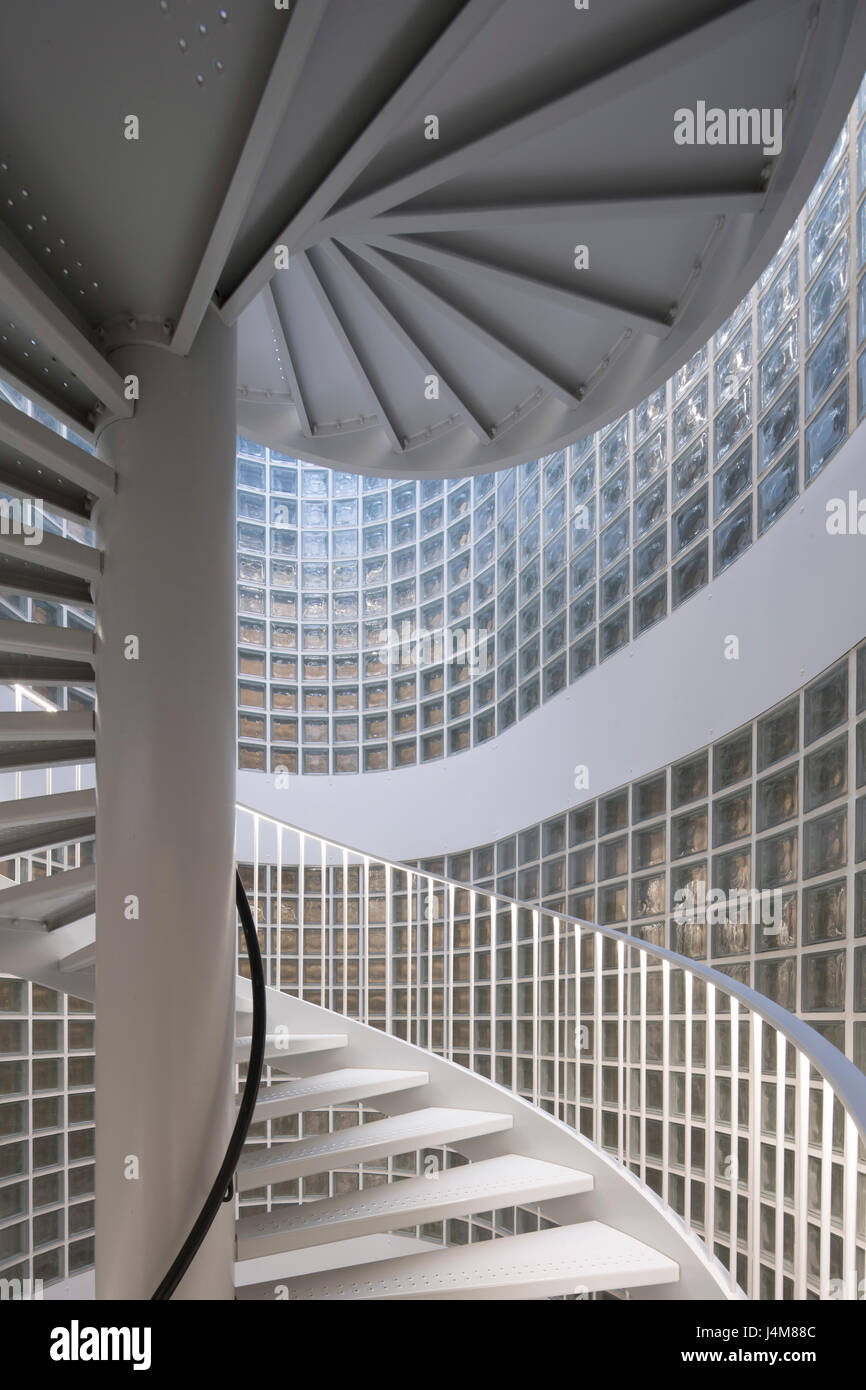 Helical staircase and glass brick facade. Housing Building, Quai Henri ...