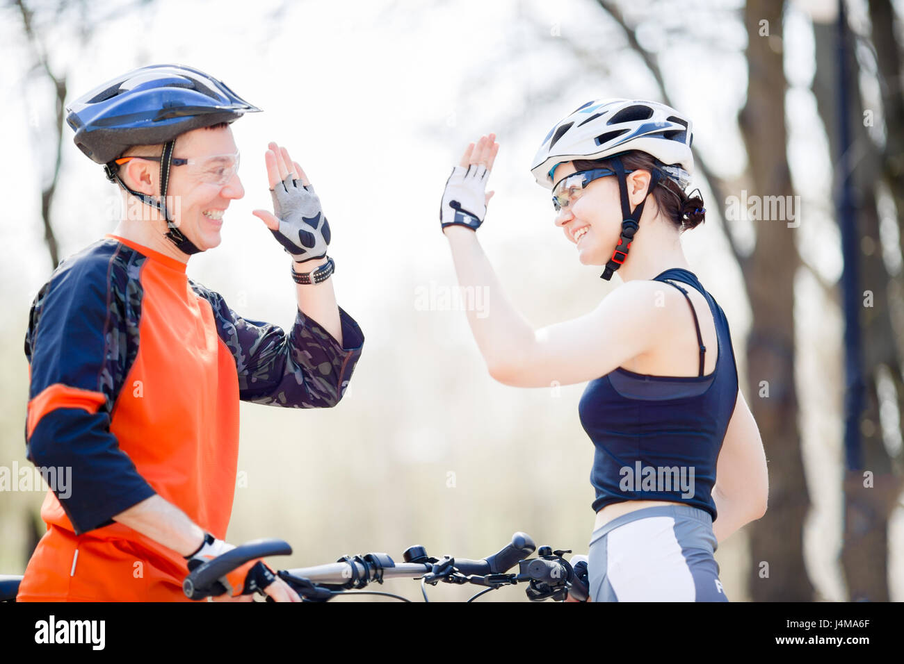 Two athletes on bike ride Stock Photo - Alamy