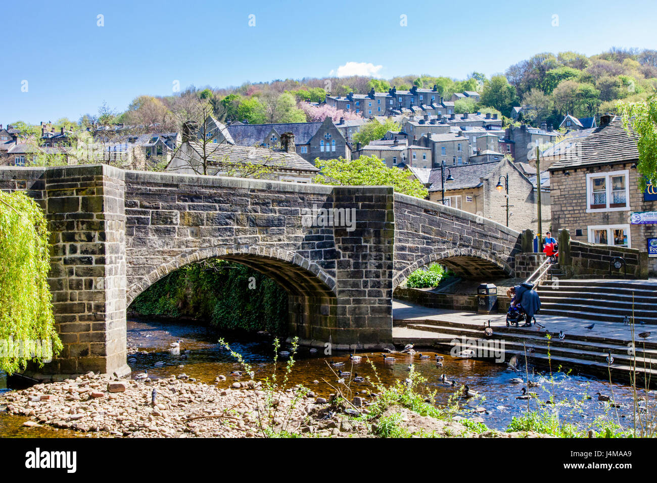 Hebden Beck running under the Old Packhorse Bridge in the centre of the ...