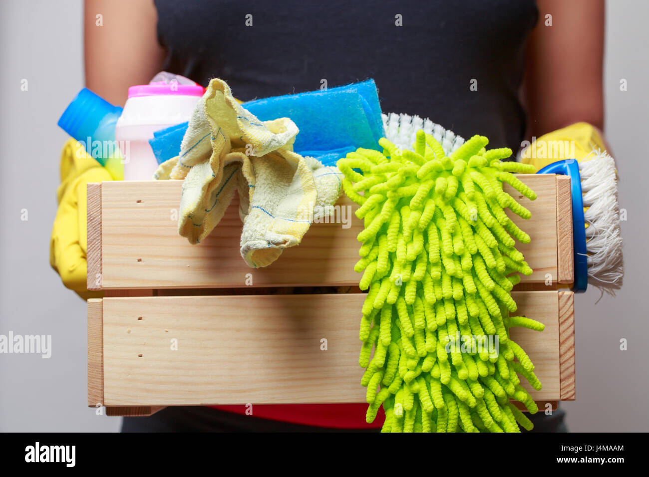 Man holding box of rags Stock Photo - Alamy