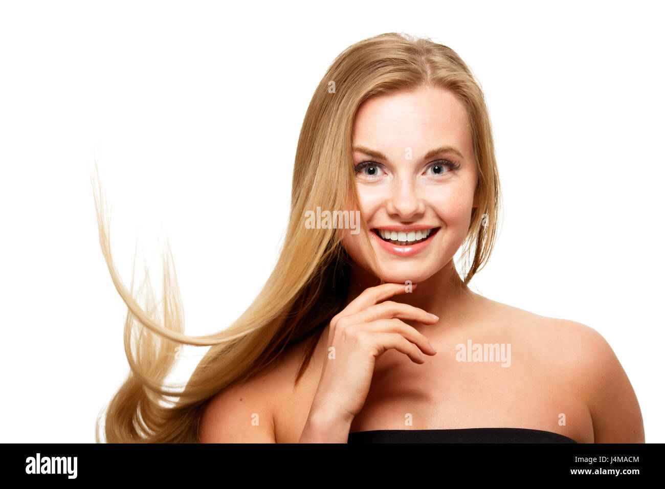 Beautiful girl with developing hair Stock Photo - Alamy