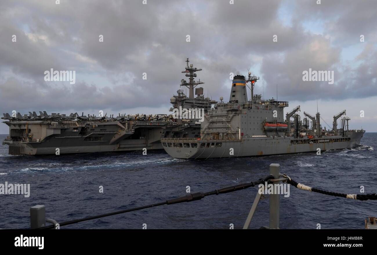 USS Wayne E. Meyer (DDG 108) conducts a replenishment-at-sea with USNS ...
