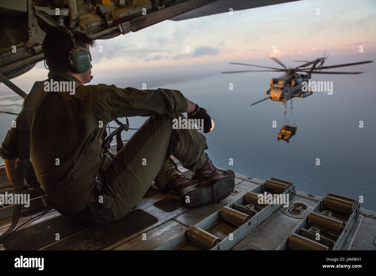 U.S. Marine Corps Cpl. Juan Sierra, a crew master assigned to Marine ...
