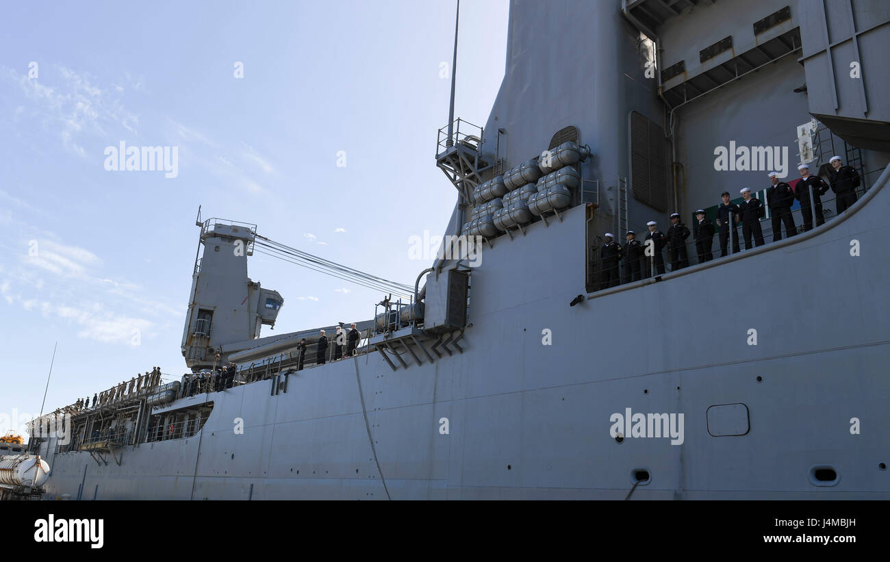 Sailors aboard USS Carter Hall (LSD 50) prepare for departure from ...
