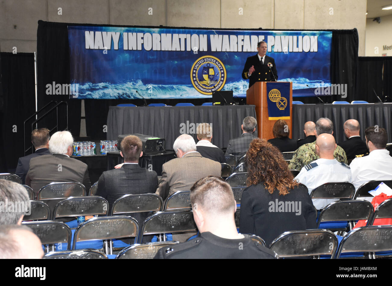 The Naval Information Forces Commander delivers a presentation at the ...
