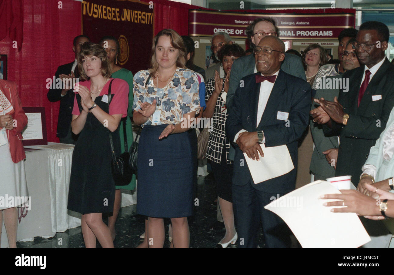 men and women clapping Stock Photo - Alamy