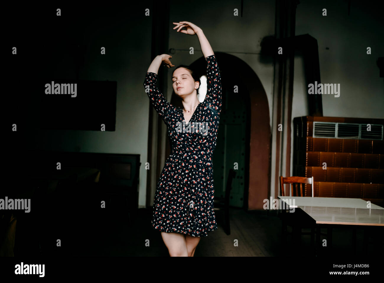 Dancing young woman sitting hi-res stock photography and images - Alamy