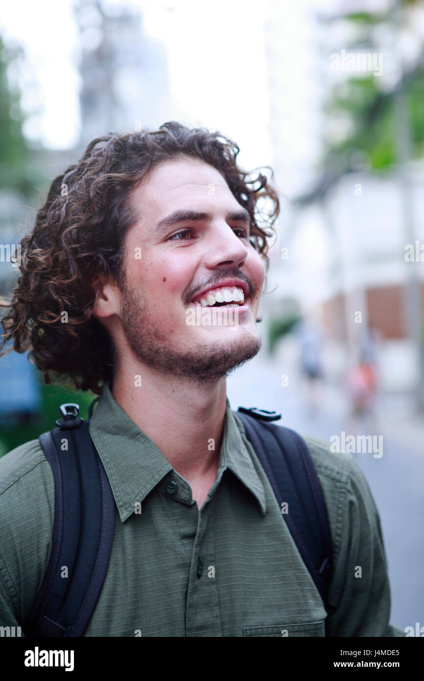 Man carrying back pack hi-res stock photography and images - Alamy
