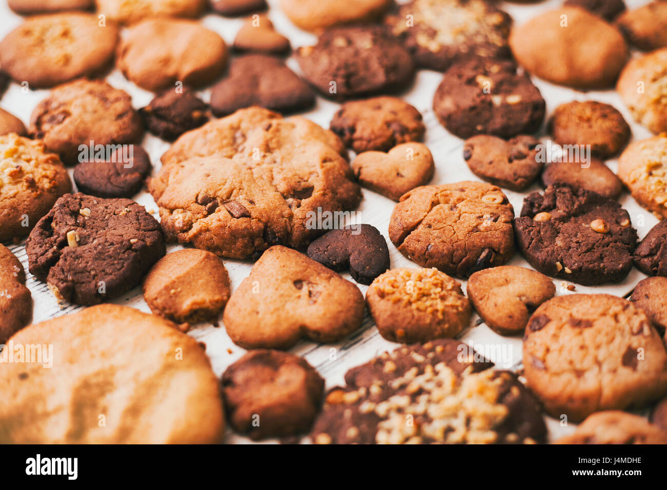 Variety of cookies on wooden table Stock Photo - Alamy
