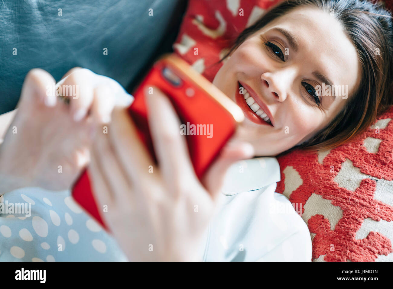 Adult laying on sofa hi-res stock photography and images - Alamy