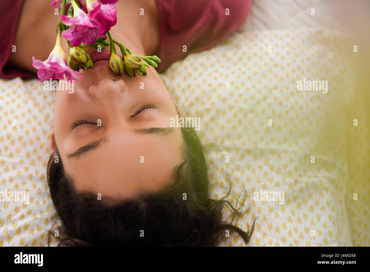 Woman laying flowers hi-res stock photography and images - Alamy