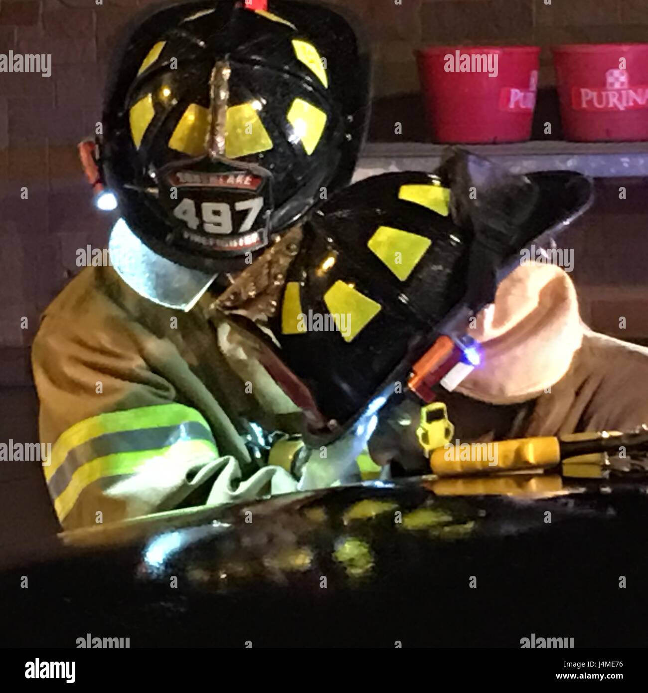 Firemen working an accident car crash Stock Photo - Alamy