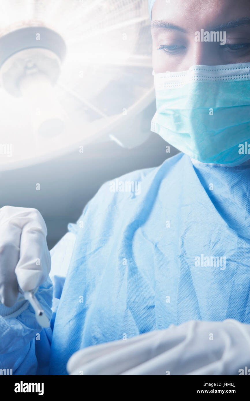 Hispanic woman holding medical hi-res stock photography and images - Alamy