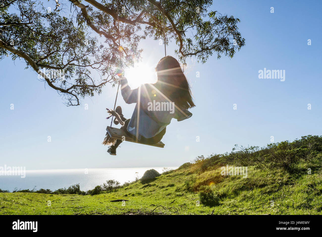 Tree swing and women hi-res stock photography and images - Alamy