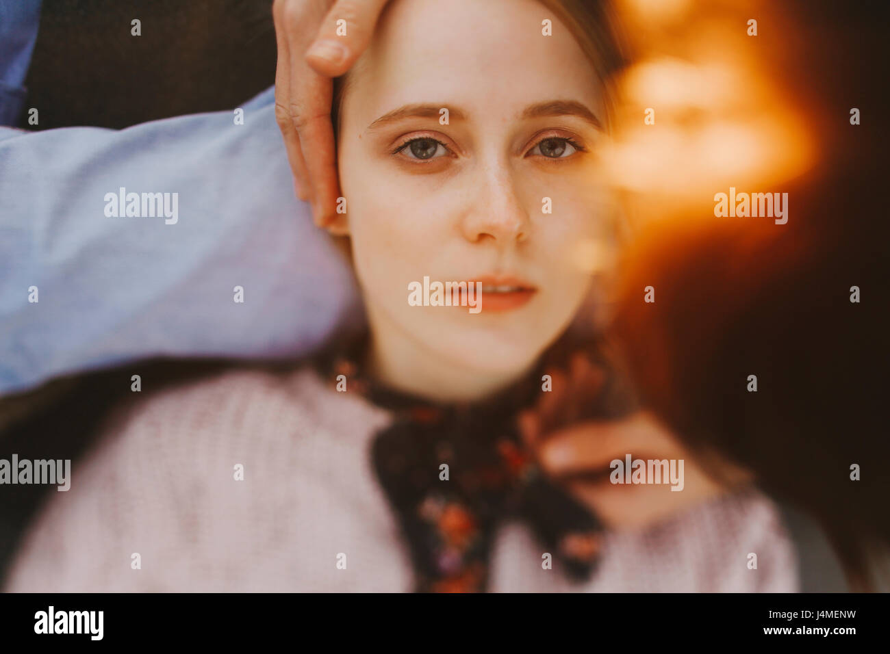 Woman laying in lap hi-res stock photography and images - Alamy