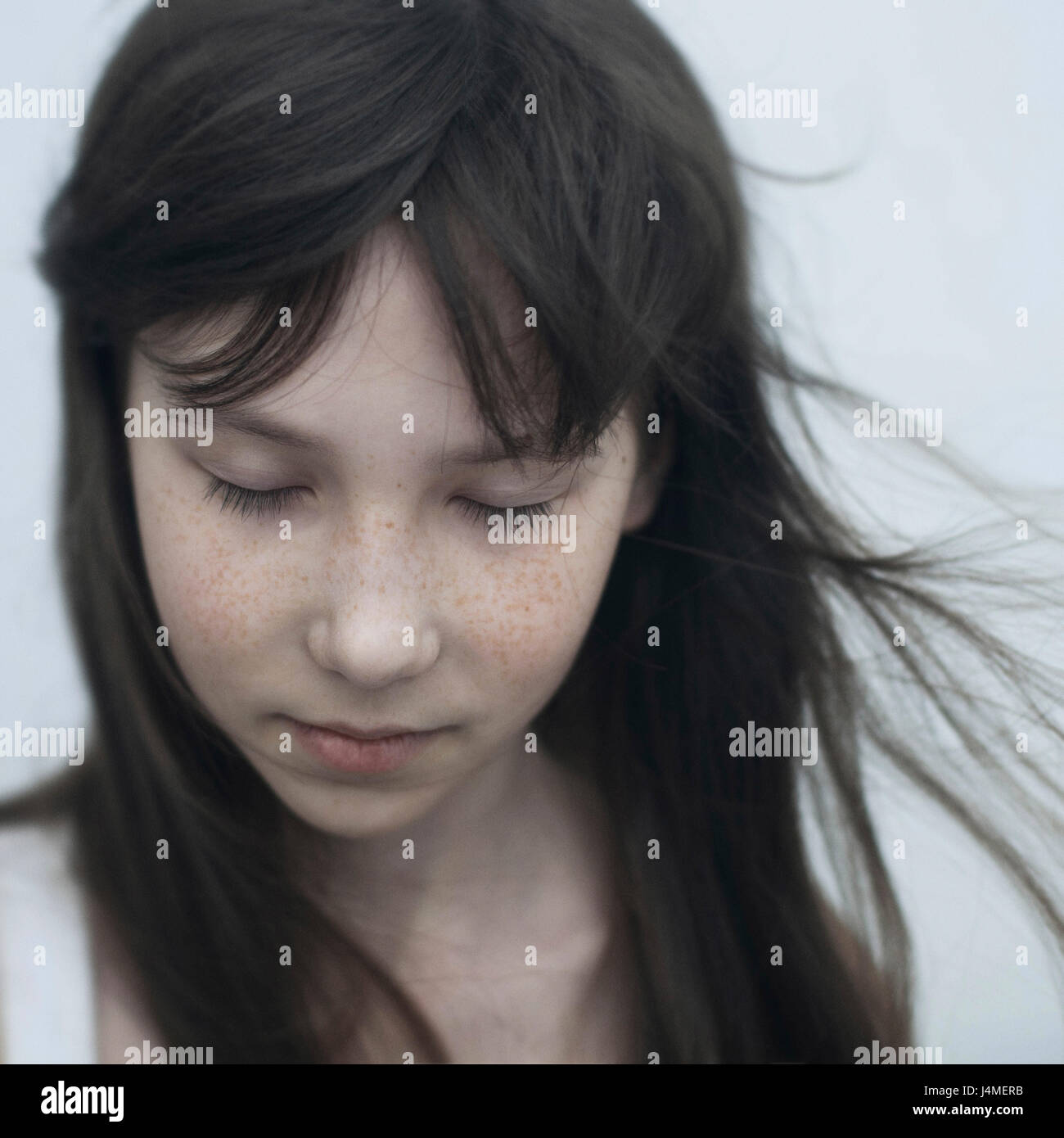 Wind blowing hair of Caucasian girl Stock Photo - Alamy