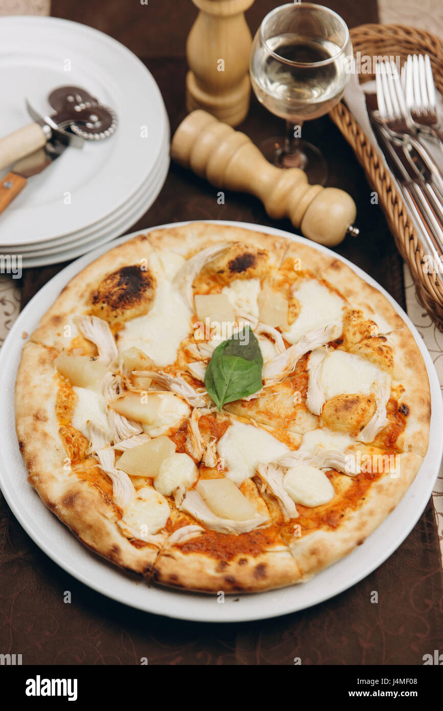 Pizza pie on table Stock Photo - Alamy